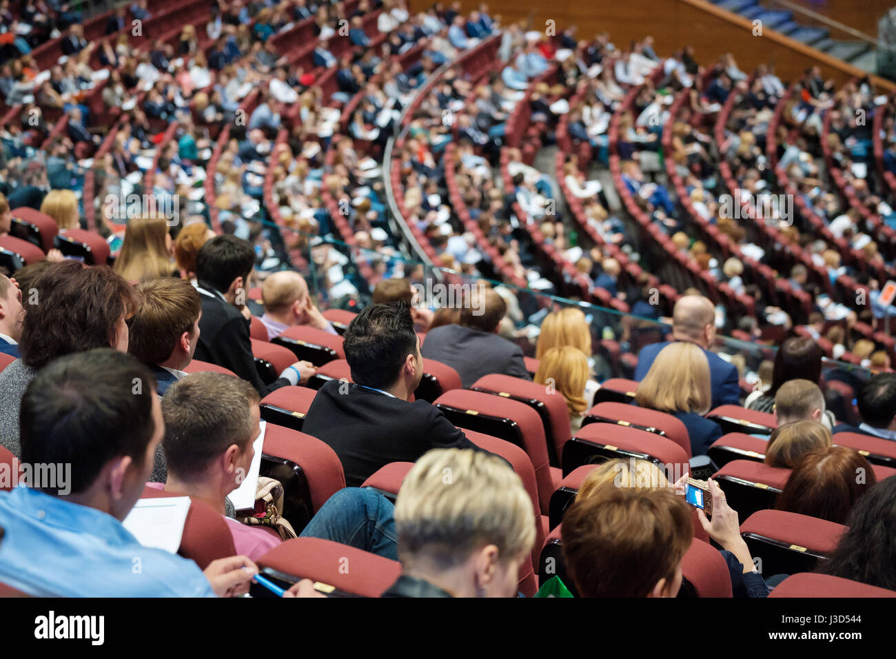 Audience at conference hall Stock Photo - Alamy