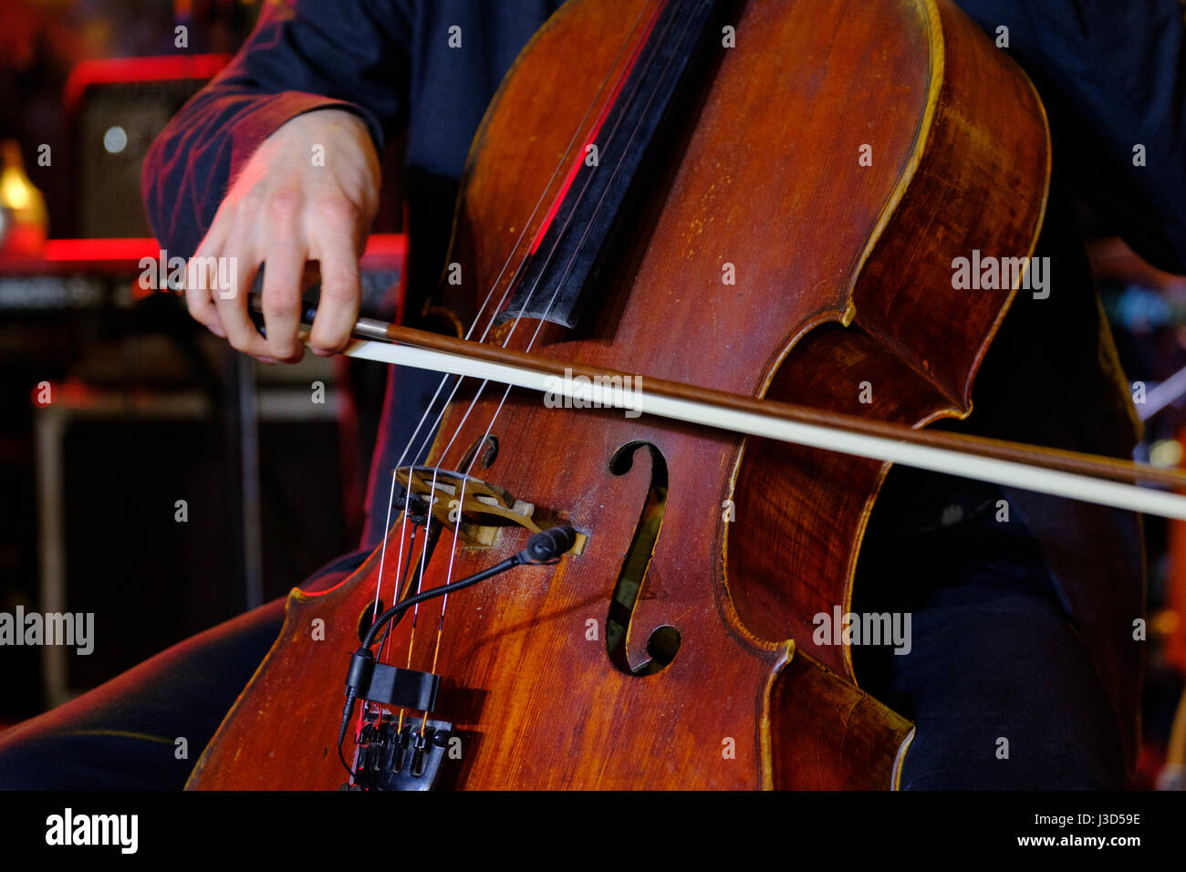 Professional cellist playing on stage hi-res stock photography and ...