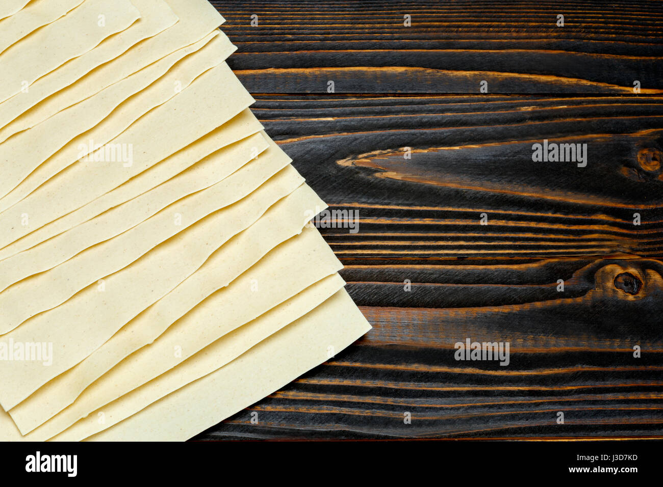 dried uncooked lasagna pasta sheets Stock Photo - Alamy