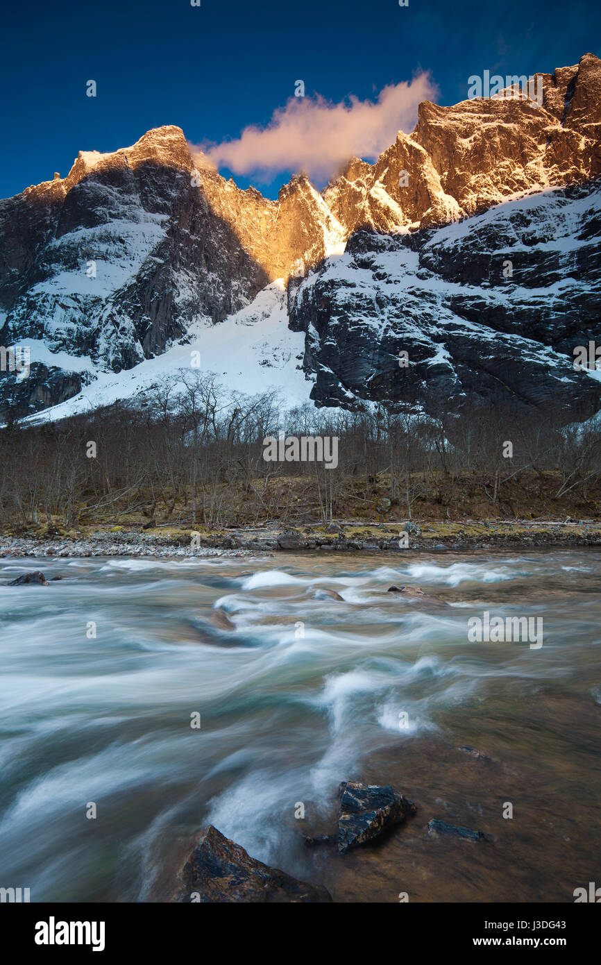 Early morning sunlight on Trollveggen, or the Troll Wall, and above ...