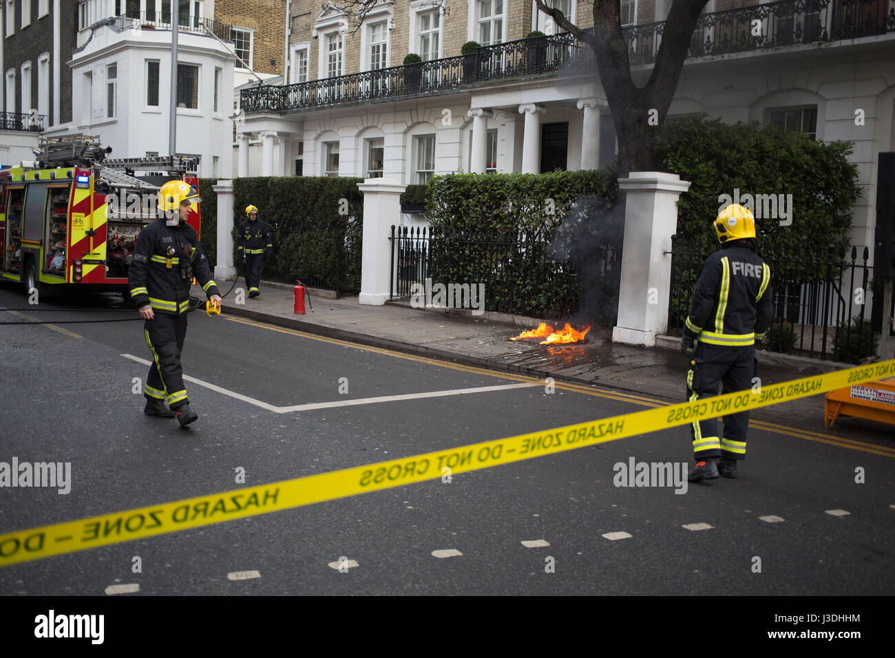 London Fire Brigade firefighters attend an electrical blaze in West ...