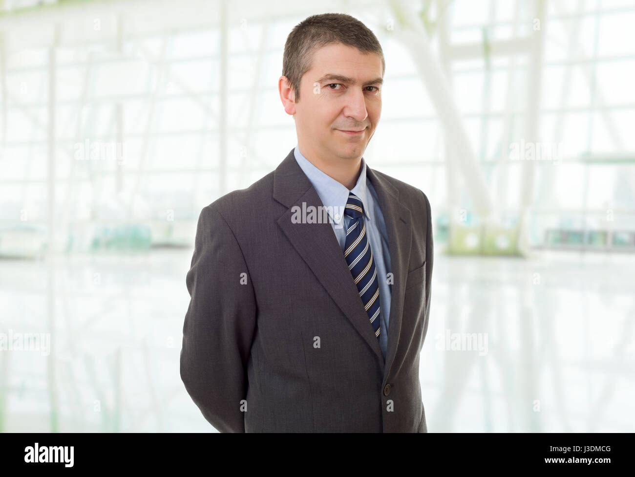 happy business man portrait at the office Stock Photo - Alamy