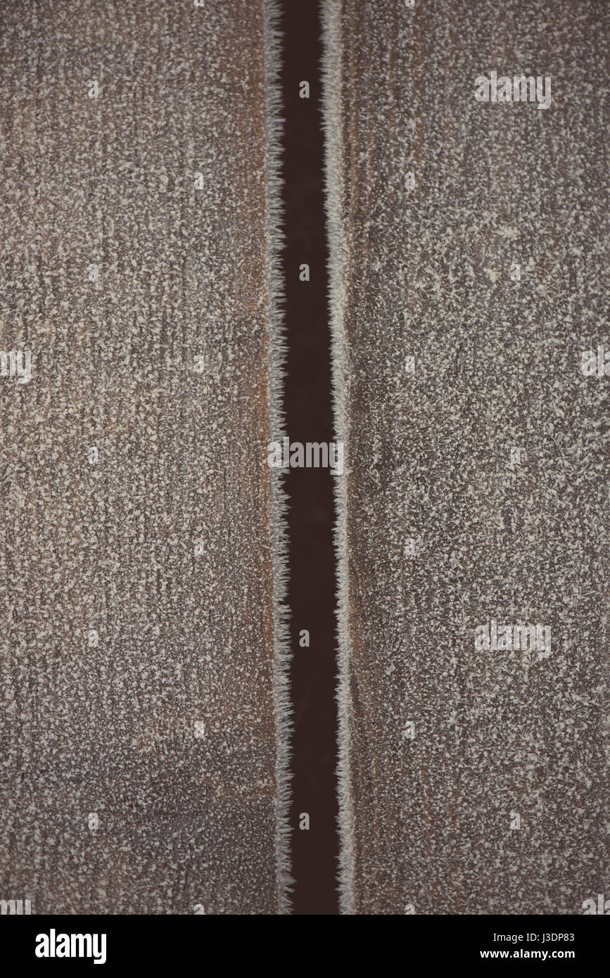 abstract wooden lines and textures in winter snow with frost - aged ...