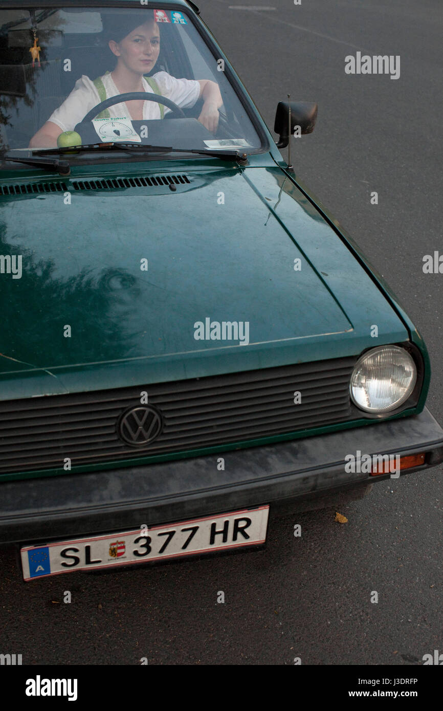A young woman in a VW Polo in Salzburg, Austria Stock Photo - Alamy