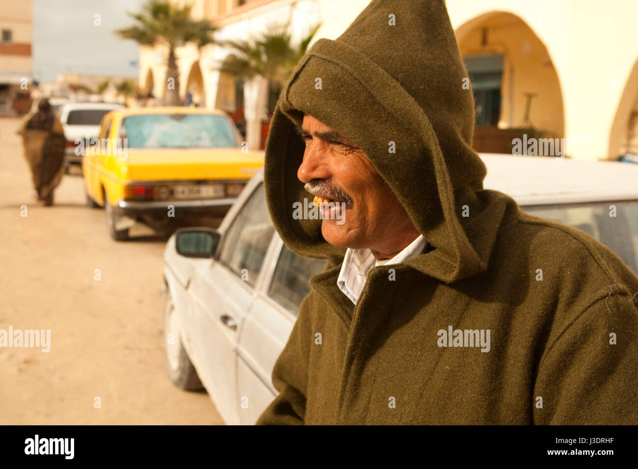 A taxi driver with red teeth dyed by betel nut in Western Sahara Stock ...