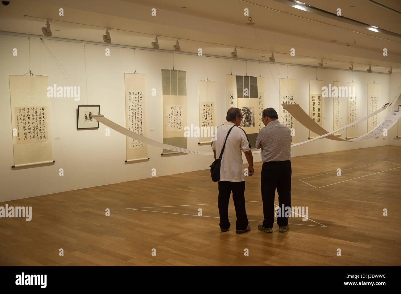 Singapore, Republic of Singapore, Asia, Visitors at the ION Art Gallery ...