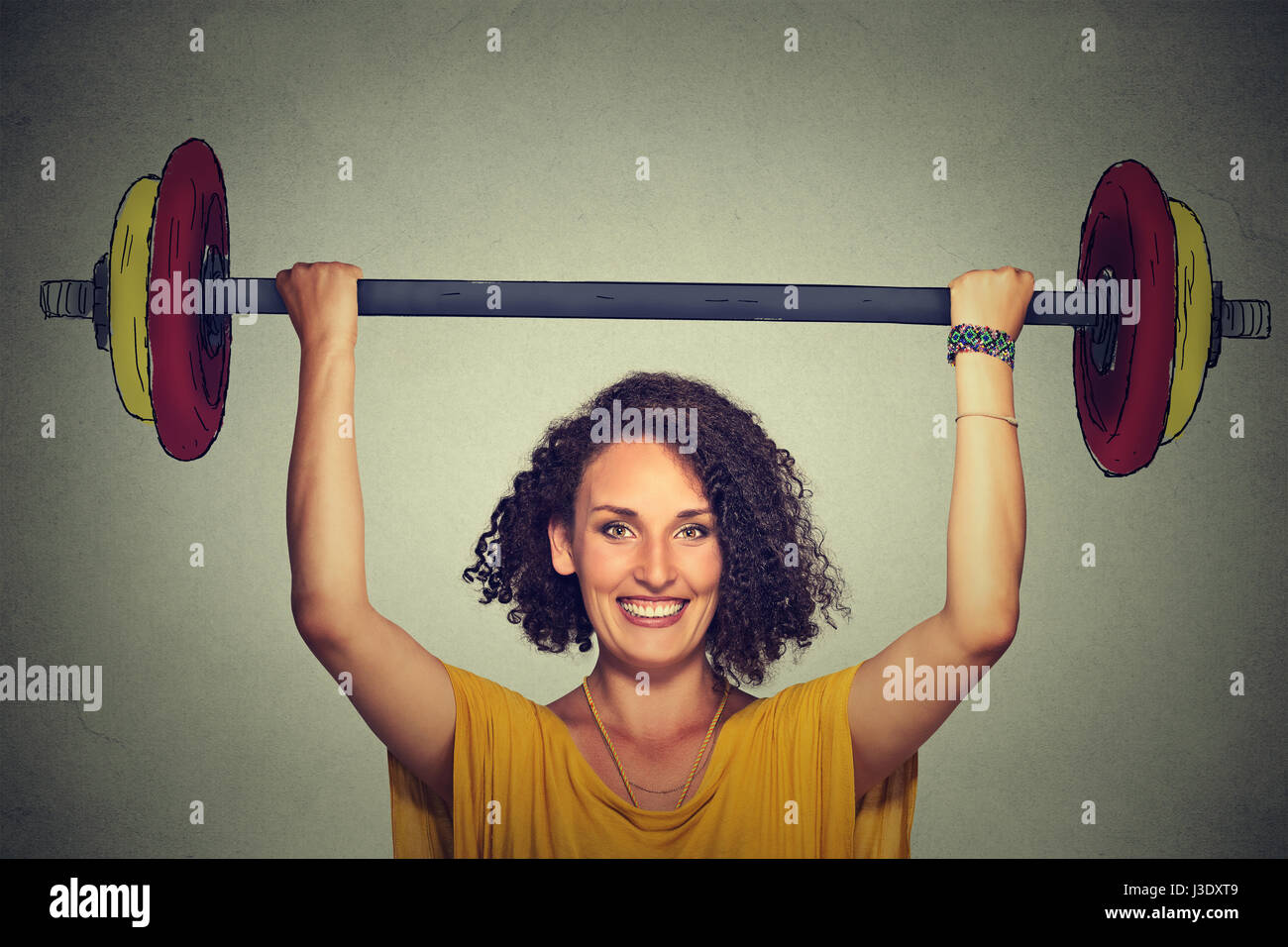 Women lifting barbell above head hi-res stock photography and images ...
