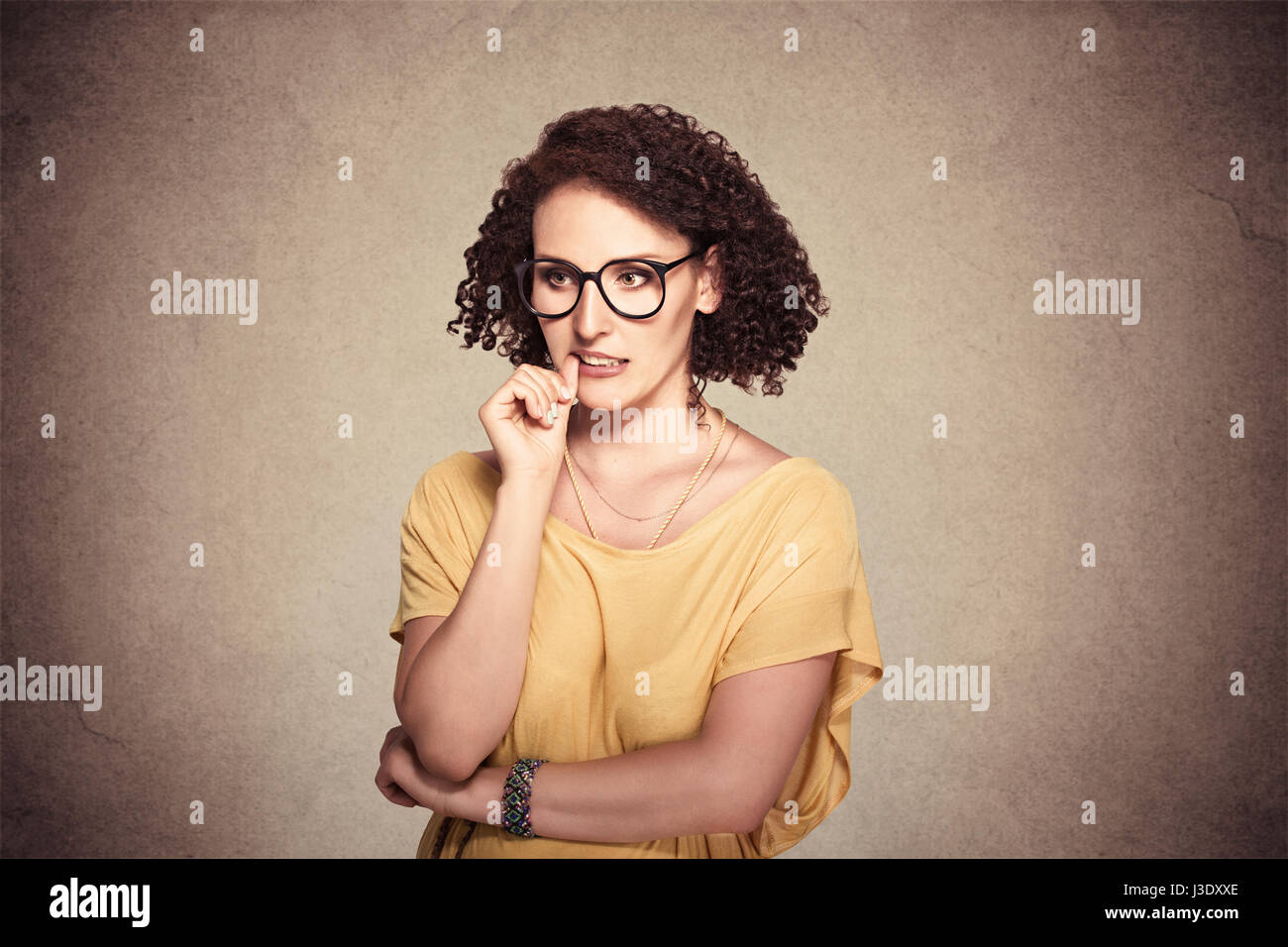 Embarrassed shy nervous young woman hi-res stock photography and images ...