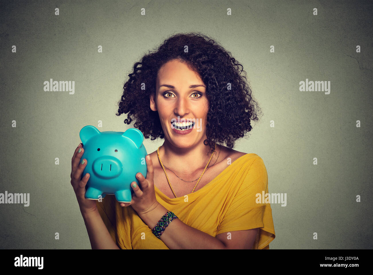 Closeup portrait happy, smiling business woman, bank employee holding ...