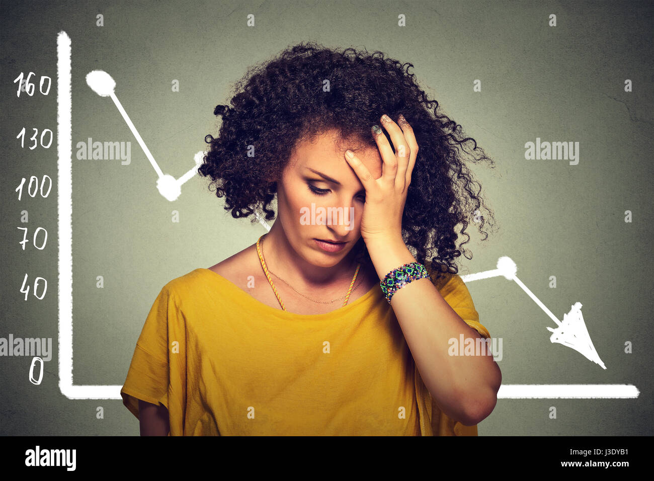 Frustrated stressed sad business woman with financial market chart ...