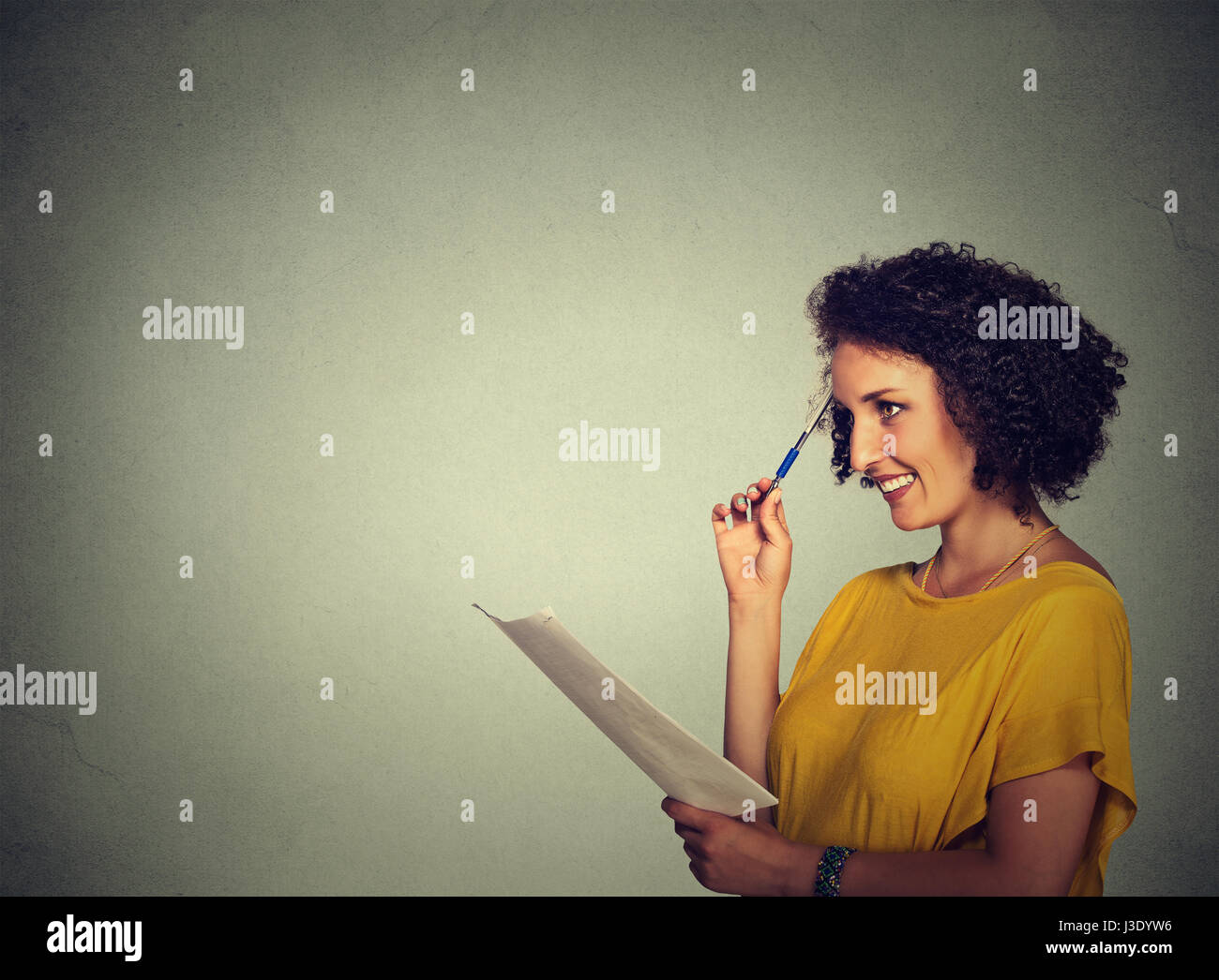 beautiful girl thinking making plans writing down ideas Stock Photo - Alamy