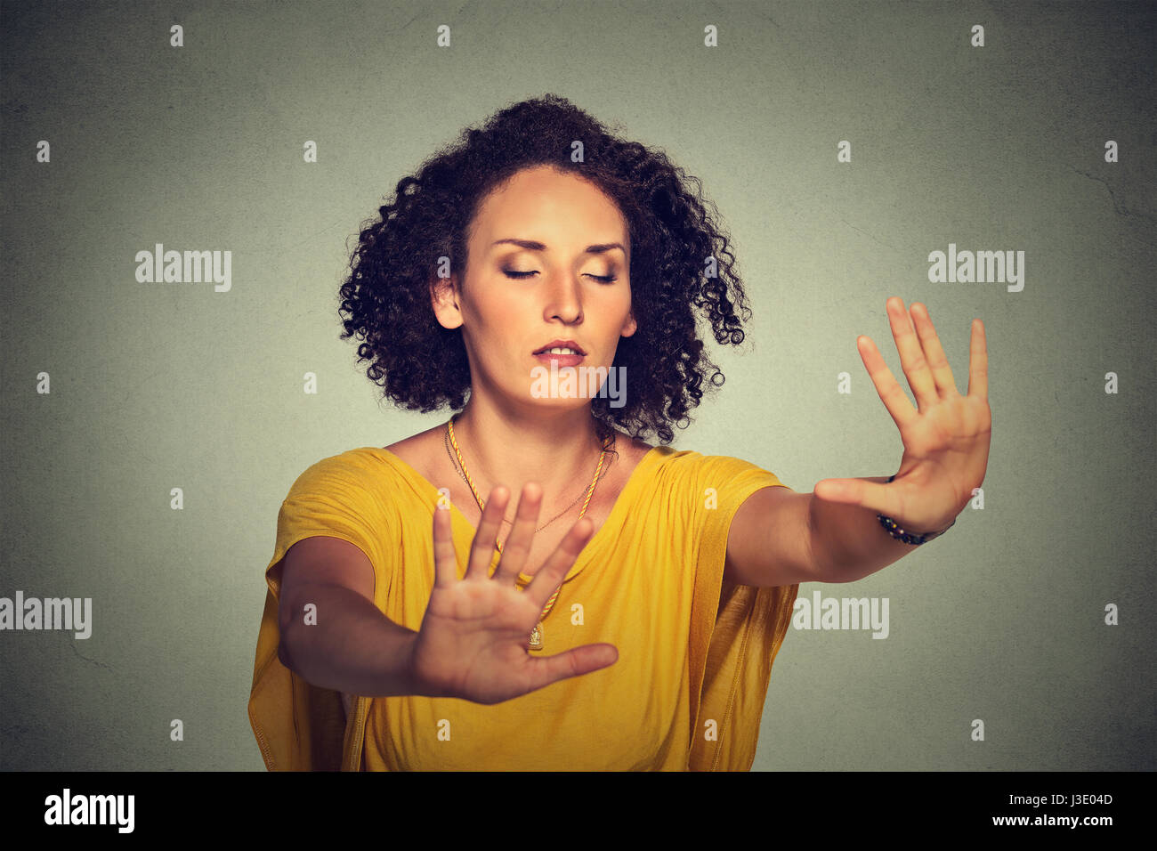 beautiful woman walking with eyes closed and hands forward Stock Photo ...