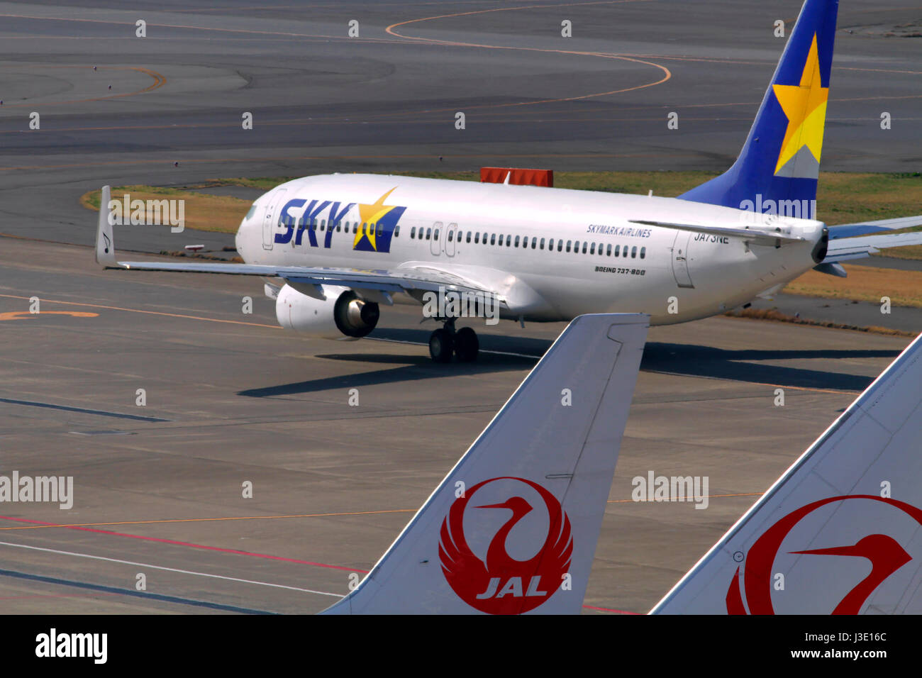 Skymark Airlines Boeing 737 taxiing at Haneda Airport Tokyo Japan Stock ...