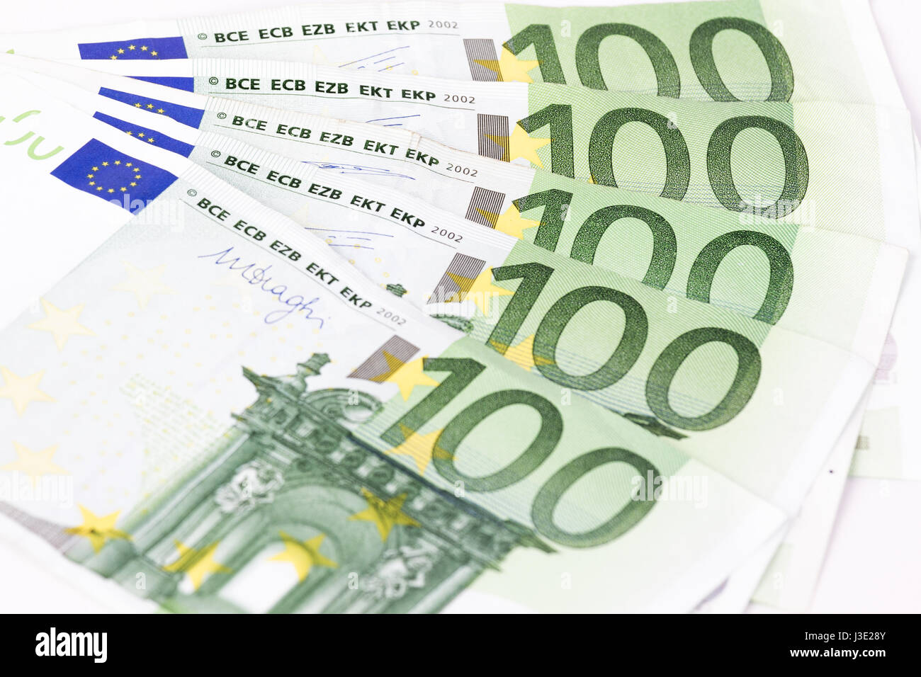 Close-up of One hundred euro banknotes on white background Stock Photo ...