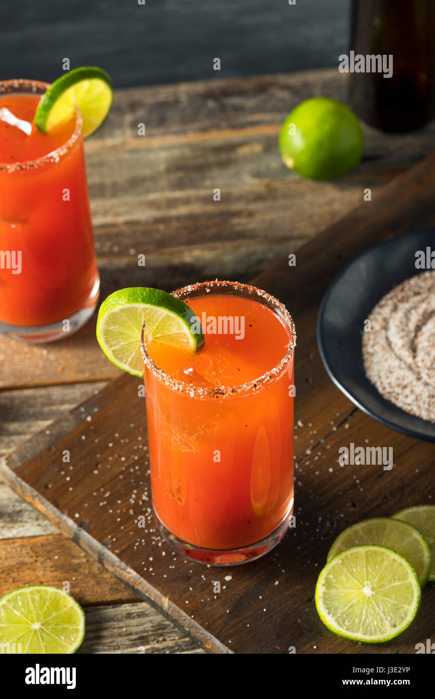 Homemade Michelada with Beer Salted Rim and Tomato Juice Stock Photo ...