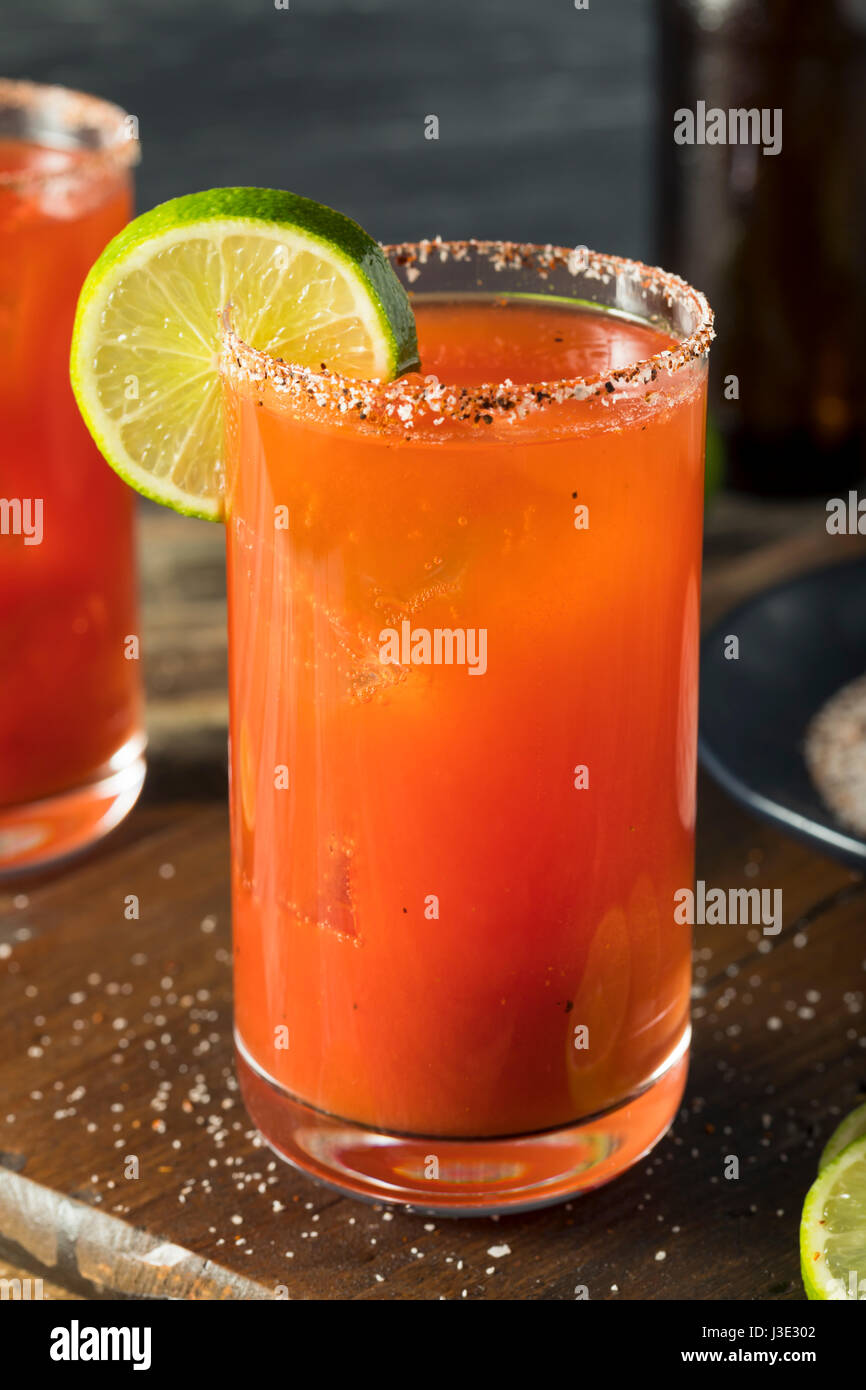Homemade Michelada with Beer Salted Rim and Tomato Juice Stock Photo ...