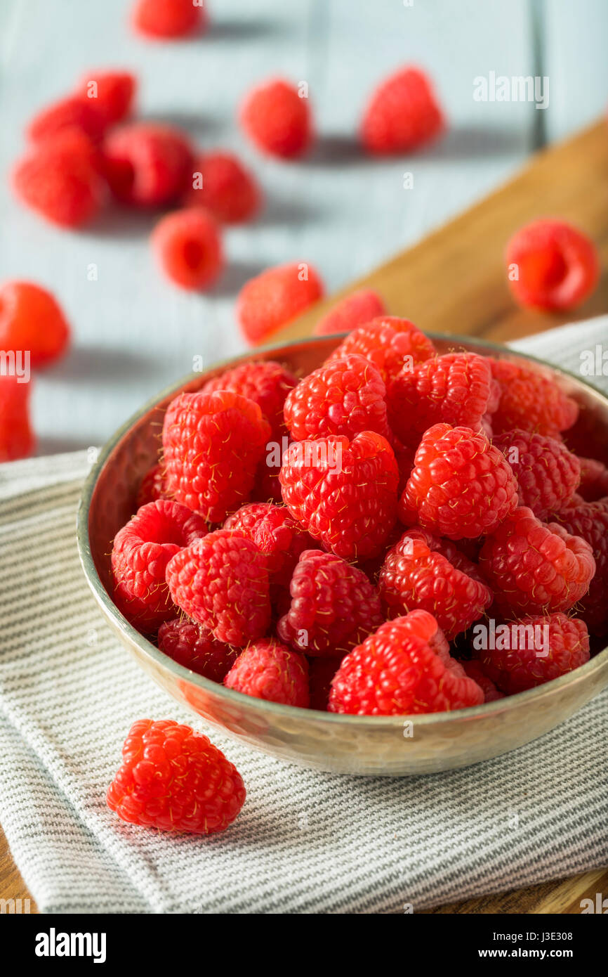 Raw Organic Red Raspberries in a Bowl Stock Photo - Alamy