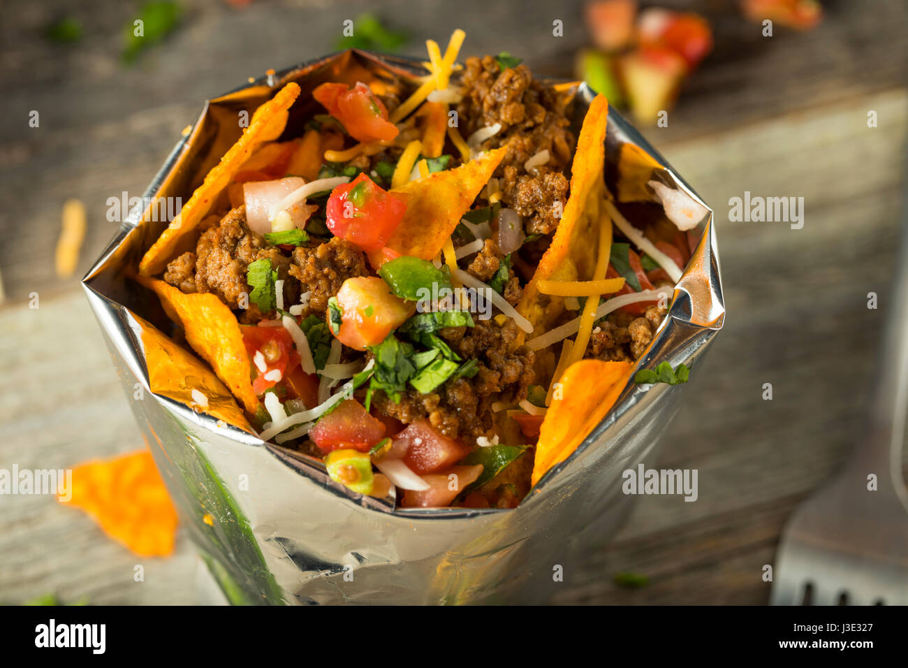 Homemade Beef Walking Taco in a Bag with Chips Stock Photo - Alamy
