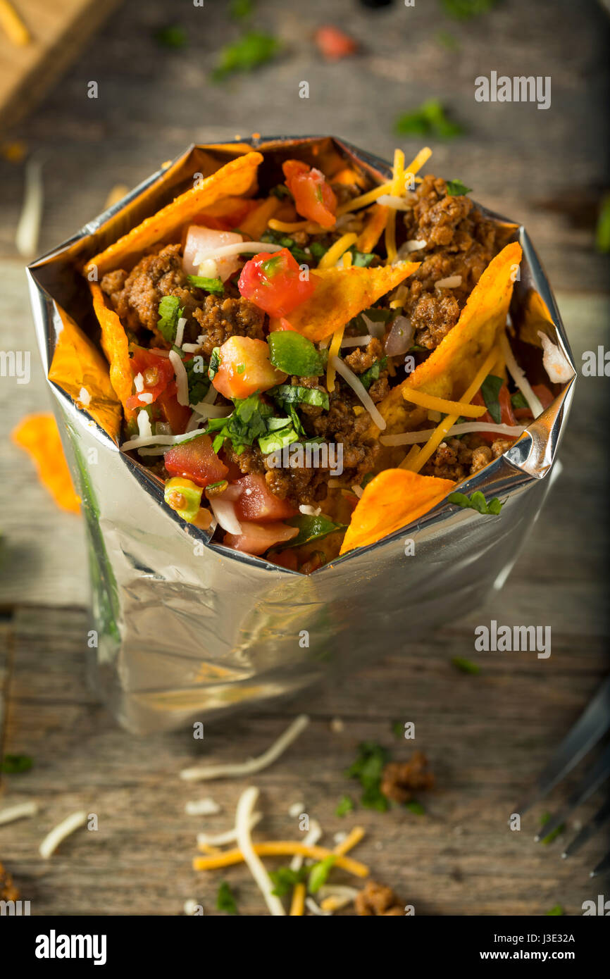 Homemade Beef Walking Taco in a Bag with Chips Stock Photo - Alamy