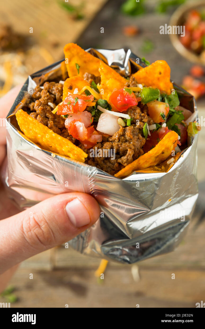 Homemade Beef Walking Taco in a Bag with Chips Stock Photo - Alamy