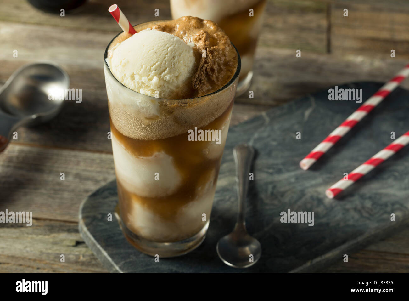 Homemade Soda Black Cow Ice Cream Float with a Straw Stock Photo - Alamy