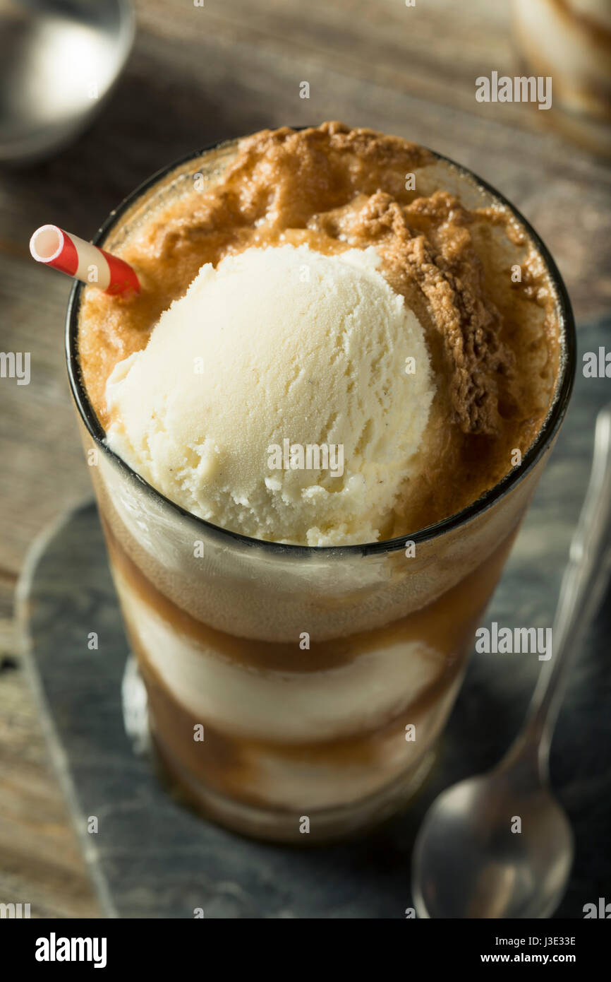Homemade Soda Black Cow Ice Cream Float with a Straw Stock Photo - Alamy