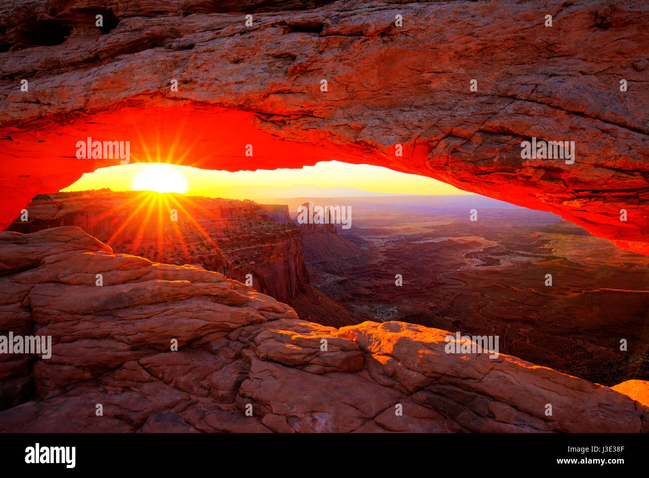 Famous sunrise at Mesa Arch Stock Photo - Alamy