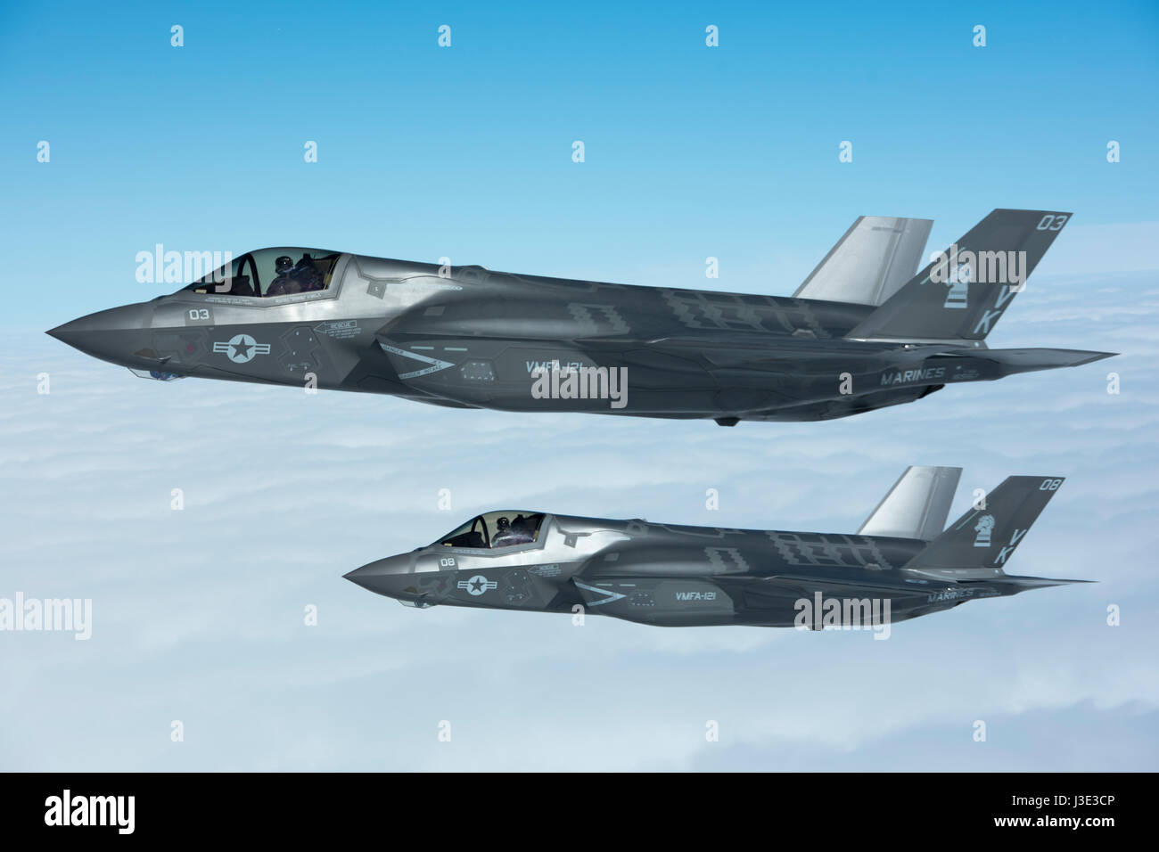 USMC F-35B Lightning II stealth fighter aircraft fly in formation March ...