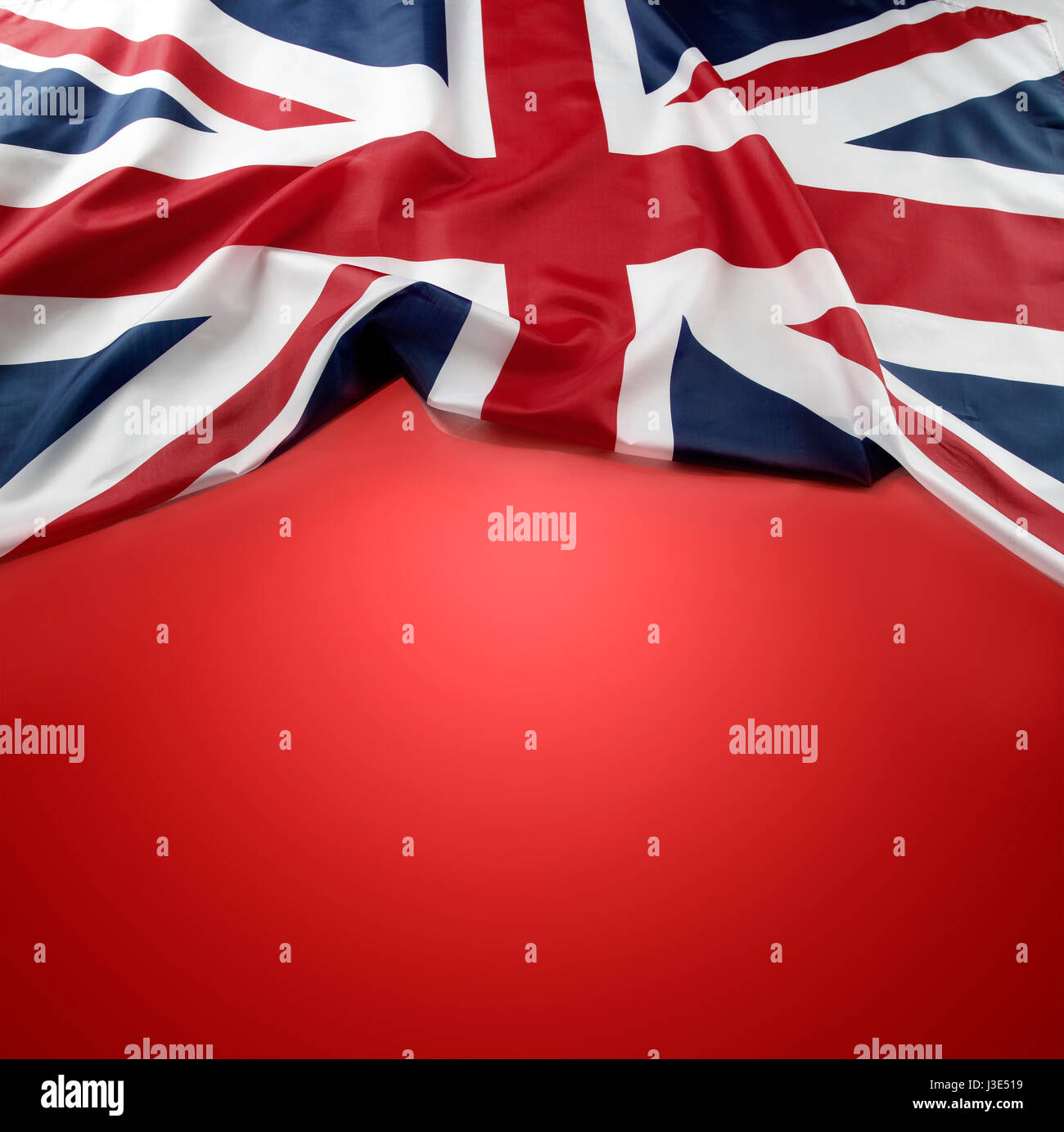 Union Jack flag on red background Stock Photo - Alamy