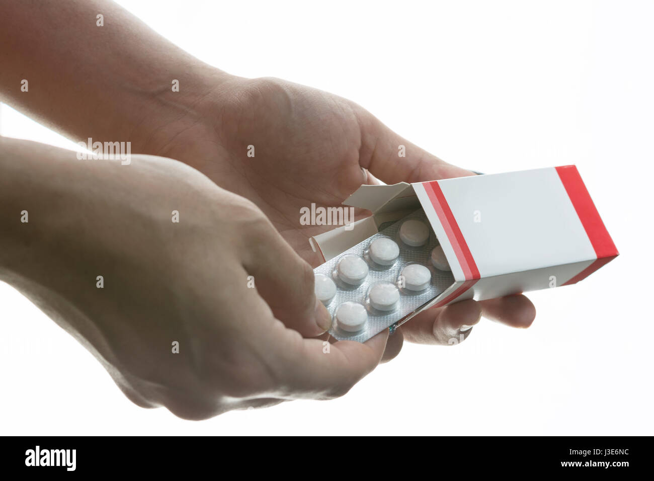 Taking out Tablets From The Pillbox by Hands Isolated on White ...