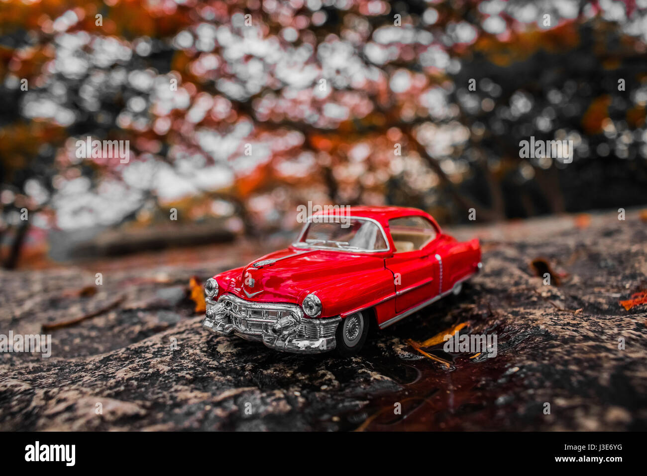 Red Toy car with Bokeh Background Stock Photo - Alamy