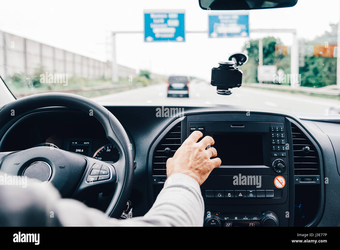 Man driving car on highway hi-res stock photography and images - Alamy