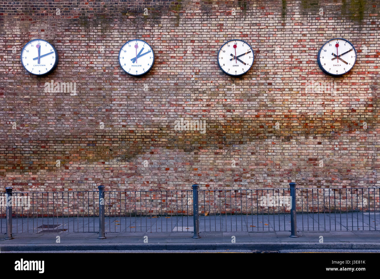 A series of clocks registering the times in major cities on Westferry ...