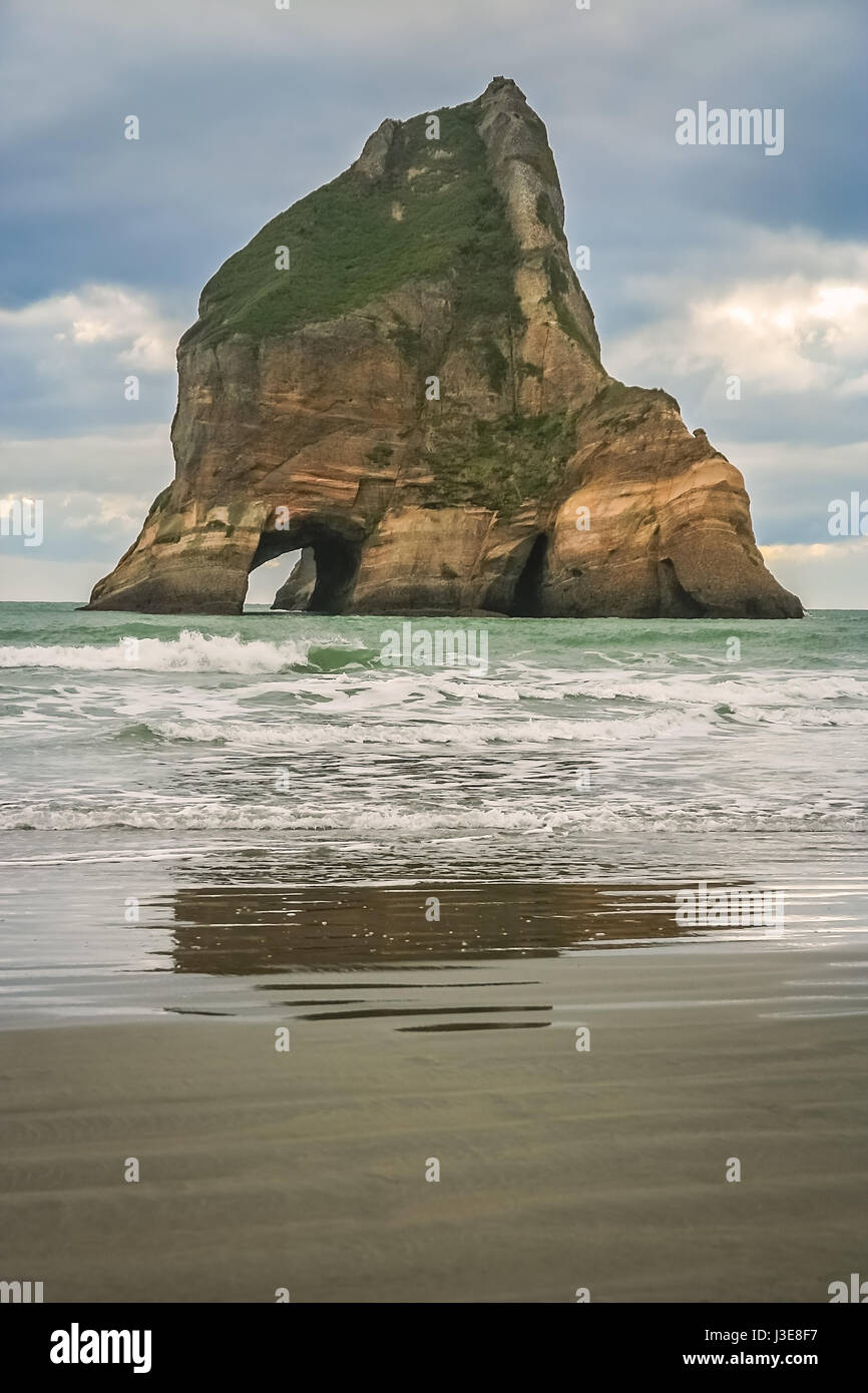 Archway Islands on the beach at Wharariki Beach near Nelson, New ...