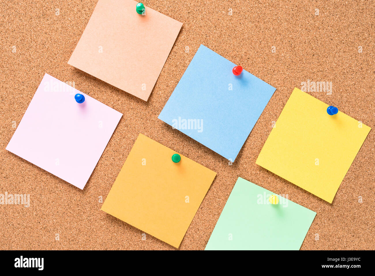 Cork board with colorful blank notes Stock Photo - Alamy