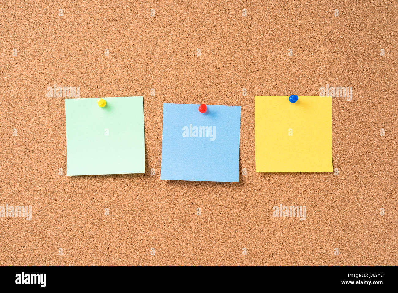 Cork board with colorful blank notes Stock Photo - Alamy