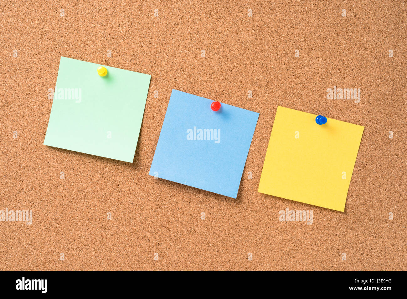 Cork board with colorful blank notes Stock Photo - Alamy