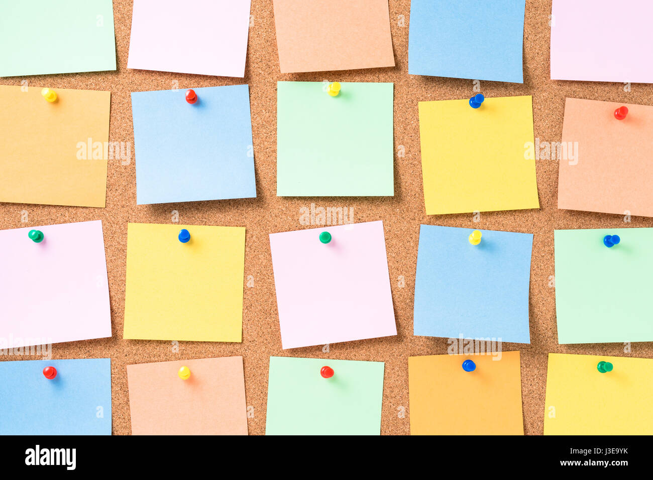 Cork board with colorful blank notes Stock Photo - Alamy