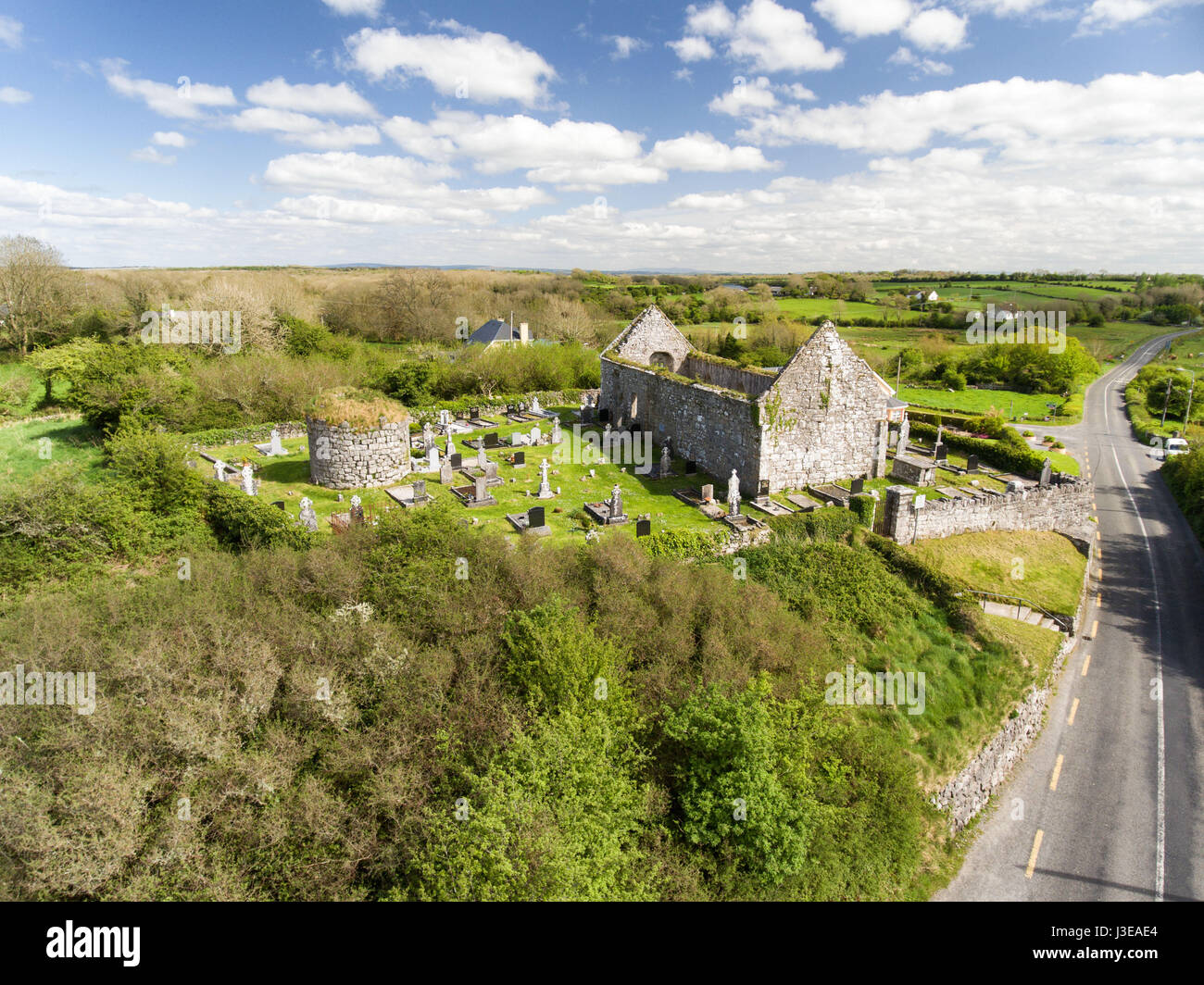 Aerial view of a beautiful old ruins of an Irish church and burial ...