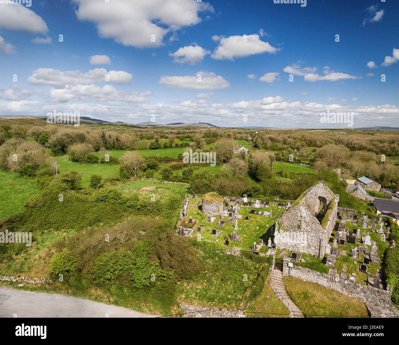 Aerial view of a beautiful old ruins of an Irish church and burial ...