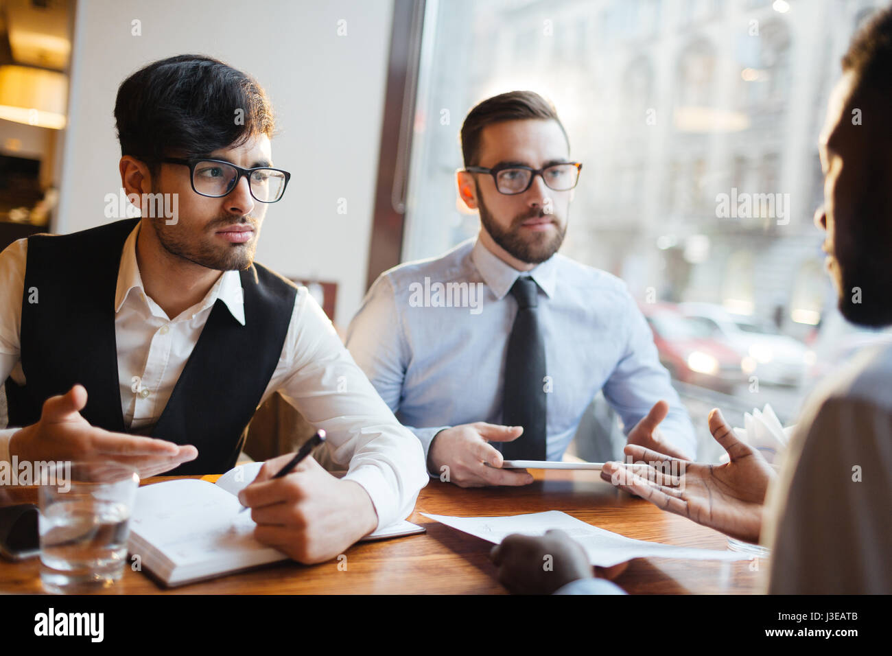 Business collaboration discussion working hi-res stock photography and ...