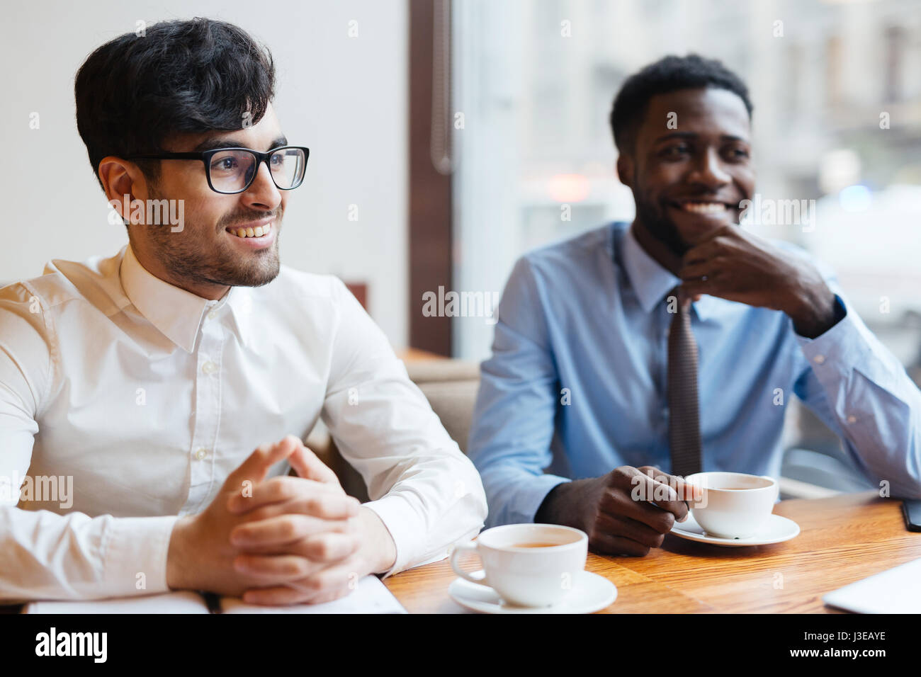 Men in cafe Stock Photo - Alamy