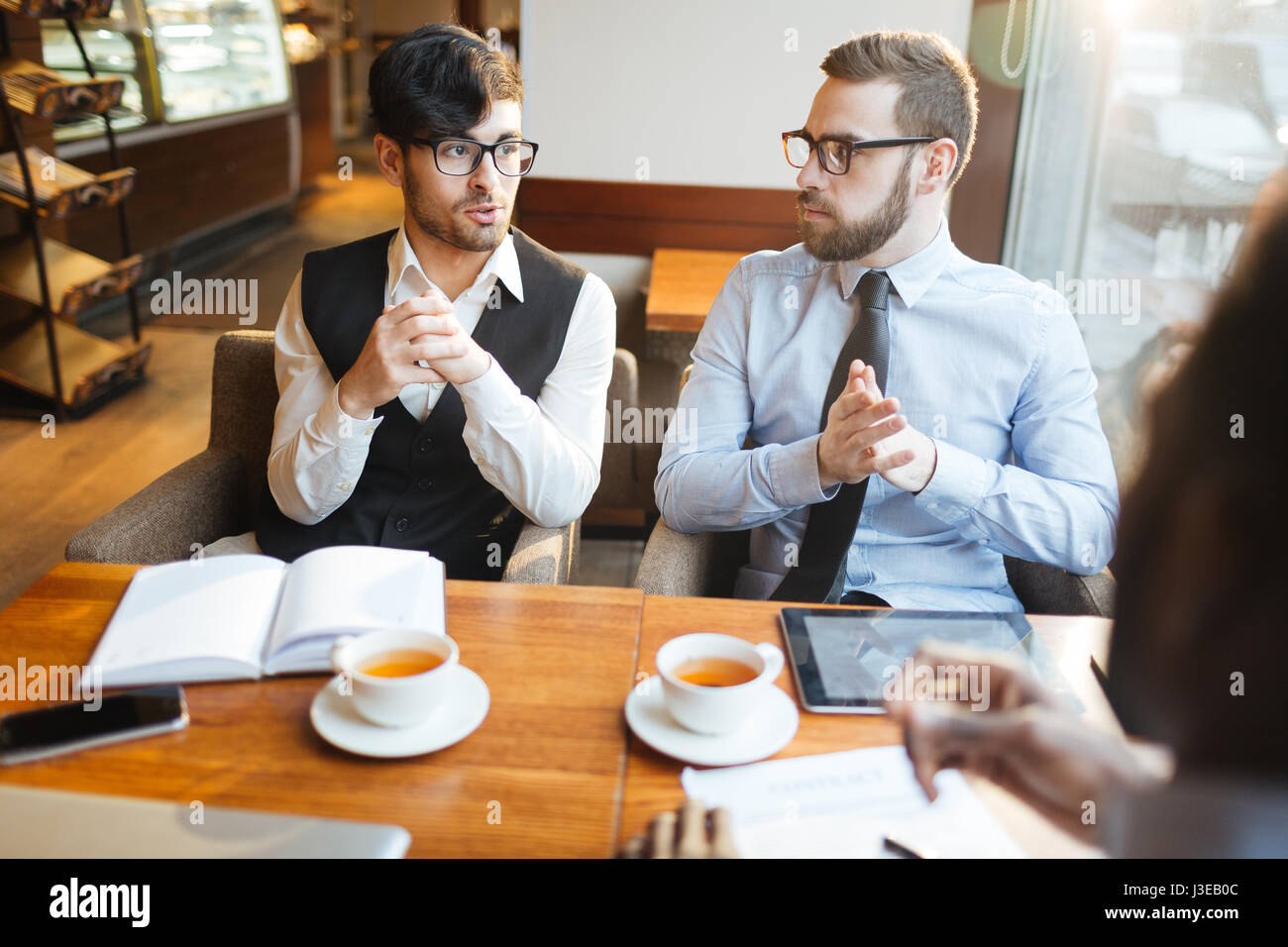 Talking at tea-break Stock Photo - Alamy