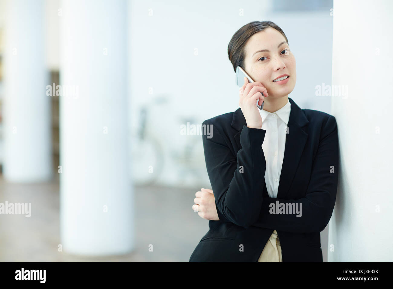 Talking to client Stock Photo - Alamy
