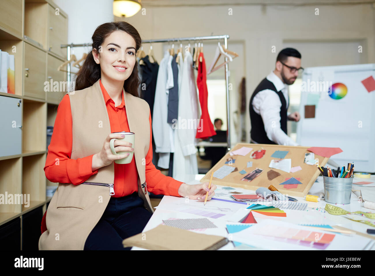 Work in fashion-studio Stock Photo - Alamy