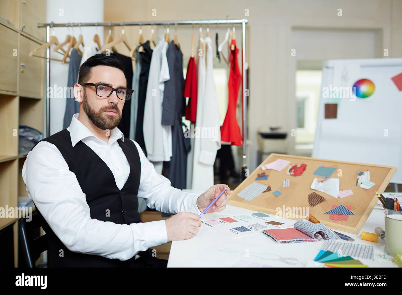 Man in fashion studio Stock Photo - Alamy