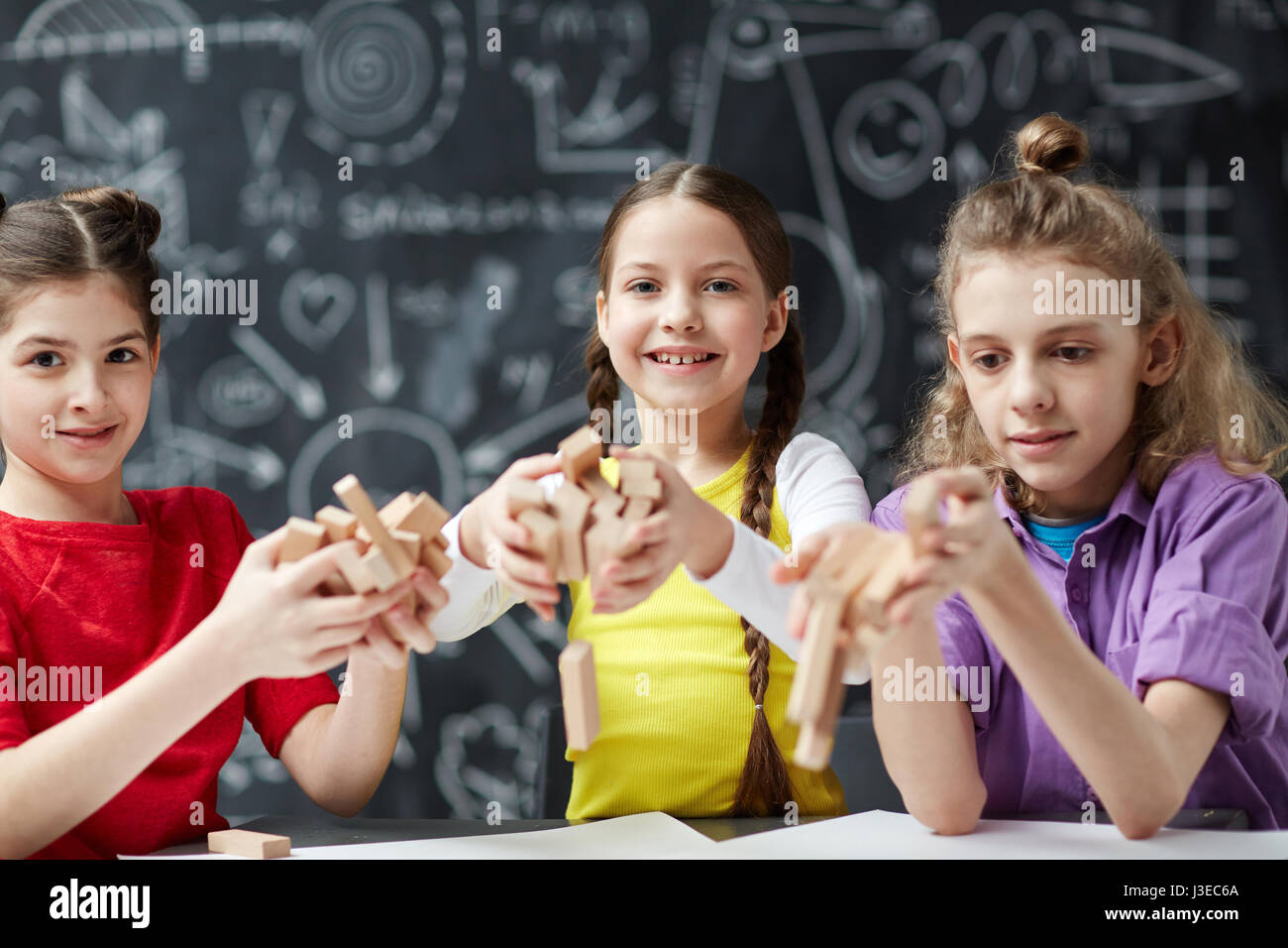Kids group build school tower hi-res stock photography and images - Alamy
