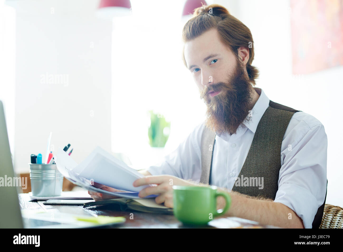Working with documents Stock Photo - Alamy