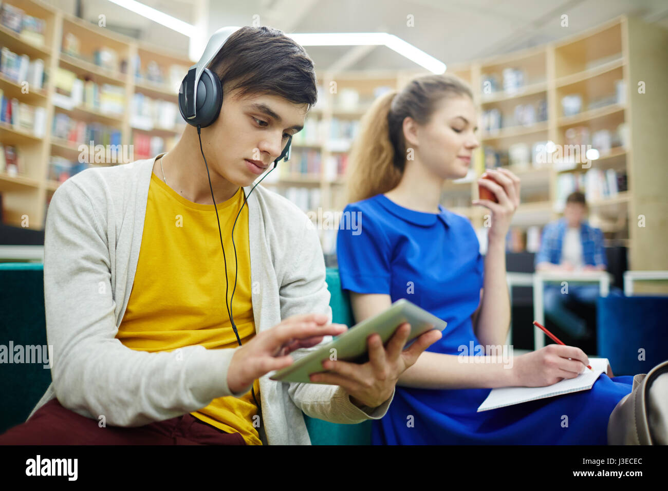 Teen girl watching video hi-res stock photography and images - Alamy