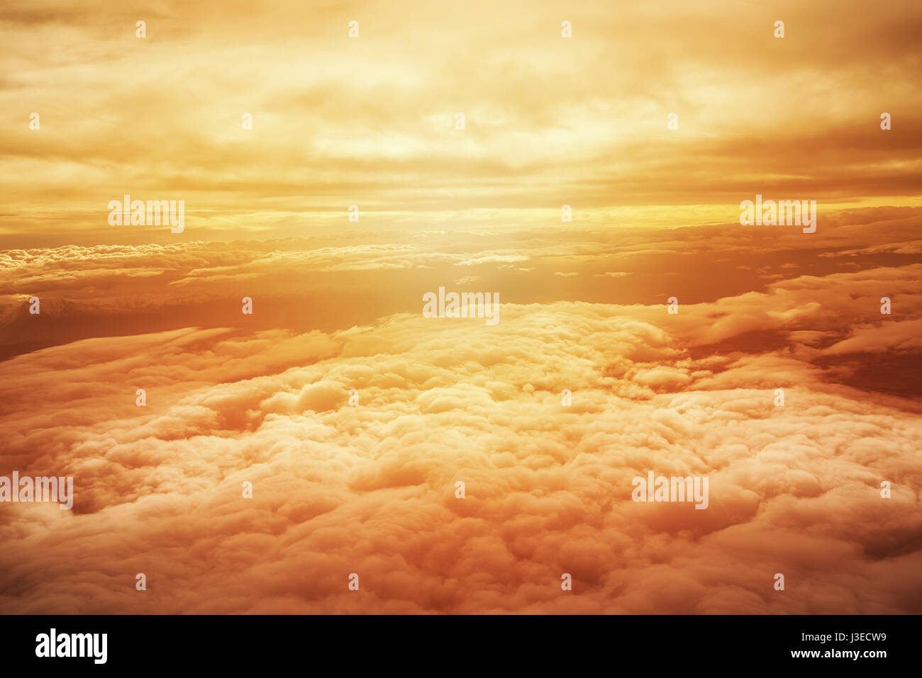Spectacular view of a sunset above the clouds from the top of the ...